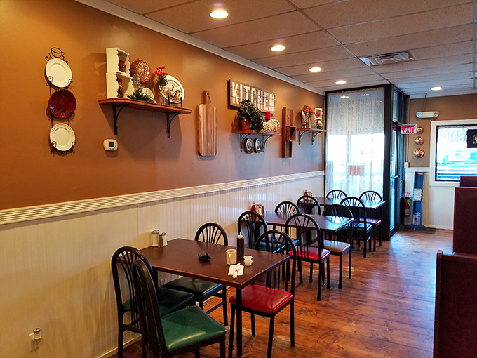 Simple wooden tables, decorative plates on the wall&mdash;this isn't interior design, it's the universal language of "come, sit, stay awhile."