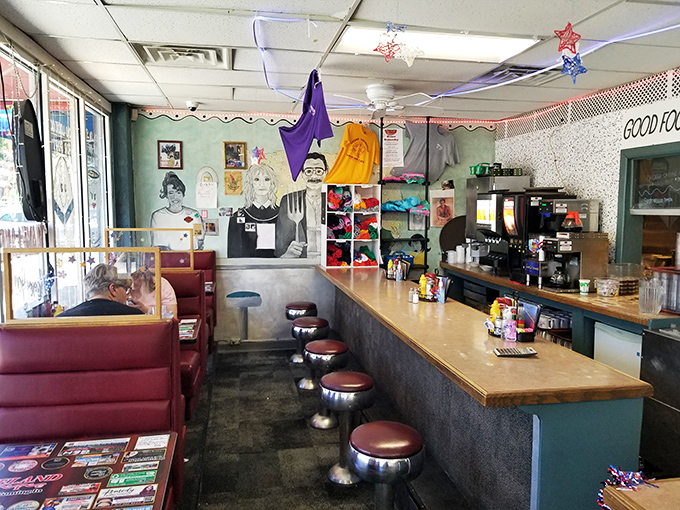 Classic counter seating where breakfast dreams come true. This isn't interior design—it's breakfast theater with front-row seats to the griddle action.