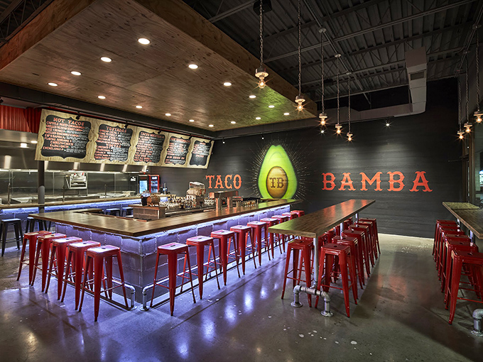 Industrial-chic meets taco temple. Those red stools aren't just seating&mdash;they're front-row tickets to the most exciting flavor show in Virginia.
