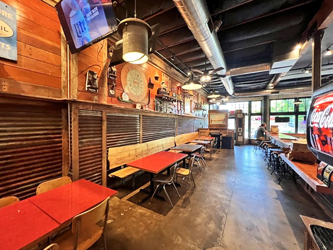 Step inside and the rustic-industrial vibe hits you&mdash;corrugated metal meets warm wood in a space that says "serious about chicken, not about pretension."