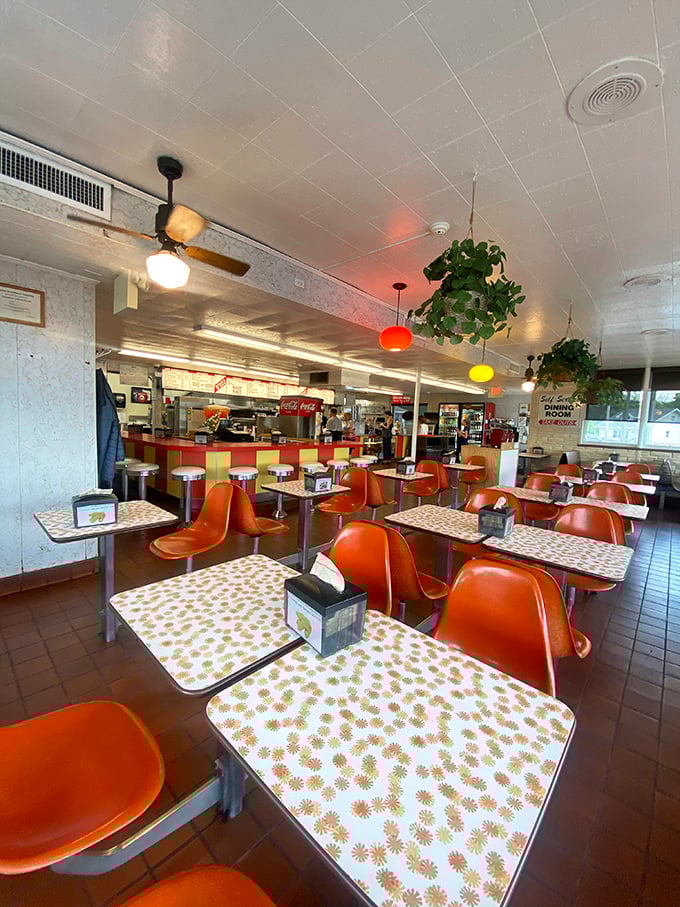 Retro orange chairs and starburst-patterned tables transport you to a simpler time when comfort food reigned supreme and calories weren't counted.
