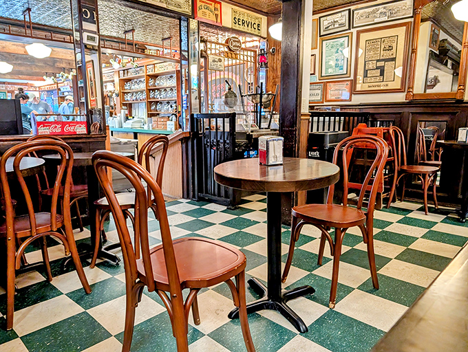 Step inside and travel back in time &ndash; that classic checkerboard floor and bentwood chairs aren't just decoration, they're portals to simpler days.