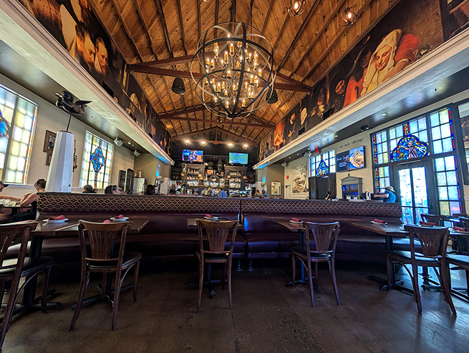 Heaven might look like this: soaring wooden beams, stained glass windows, and a chandelier that makes everyone look Instagram-ready. Hallelujah!