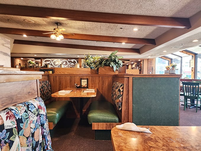 Cozy wooden booths where pie dreams come true. These seats have witnessed more dessert euphoria than a cooking show finale.