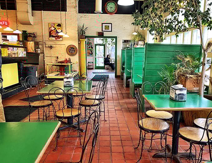 Step inside to a world where time slows down &ndash; vintage green tables, wrought iron chairs, and lush plants create an oasis for ice cream contemplation.