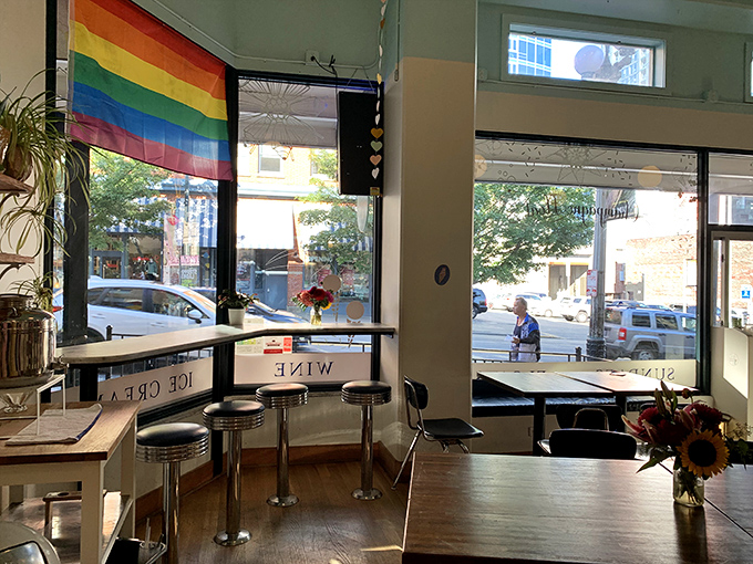 Rainbow flag proudly displayed, chrome stools waiting for your posterior. This isn't just an ice cream shop—it's a judgment-free zone for dessert enthusiasts.
