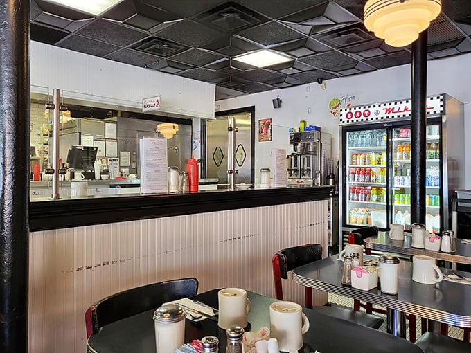 Classic diner counter culture at its finest&mdash;where coffee mugs stand ready for refills and conversations flow as freely as the maple syrup.