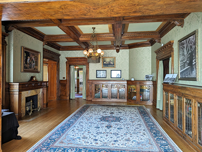 Stepping into the reception room feels like time-traveling to the Gilded Age. That ornate woodwork and period-perfect decor weren't ordered from a catalog&mdash;they're the real McCoy.