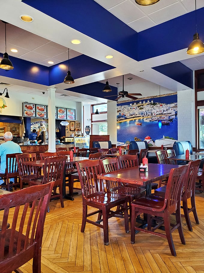 Blue and white ceiling details transport you straight to the Aegean, while that stunning harbor mural has you mentally packing your swimsuit.