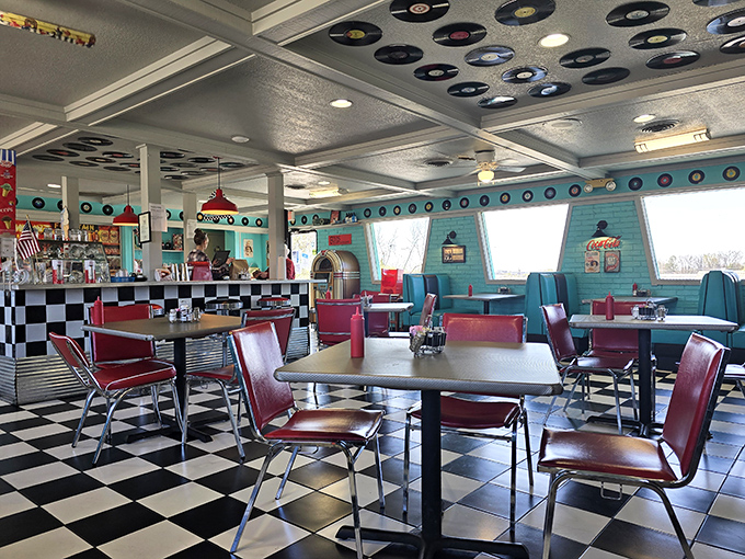 Vinyl records on the ceiling, checkered floors below, and enough nostalgic charm to make you wonder if you've stepped through a time portal.