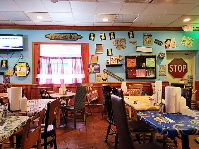 Step inside and the restaurant's personality explodes like a confetti cannon of nostalgia&mdash;colorful tablecloths, mismatched chairs, and walls that tell stories through decades of collected memorabilia.
