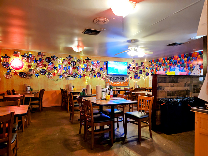 Step inside and you're greeted by a celebration that never ends. The festive decor with American flags and colorful banners creates the perfect backdrop for serious meat appreciation.