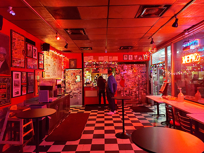 Step inside and the red glow feels like you've entered barbecue purgatory—except here, the sins are delicious and the punishment is more sauce.
