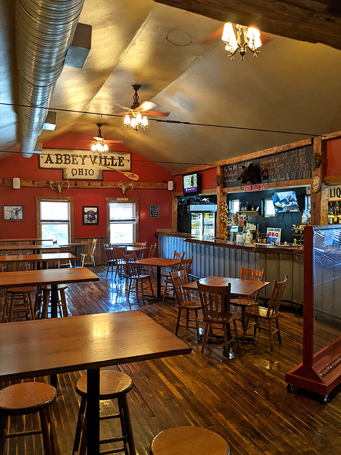 Rustic charm meets comfort in this warm interior where the "Abbeyville, Ohio" sign watches over countless satisfied diners.