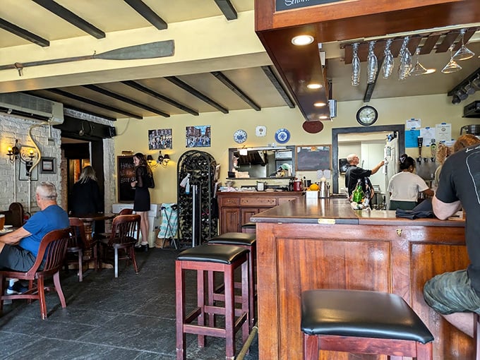 Exposed wooden beams, warm lighting, and that inviting bar &ndash; this isn't just dining, it's a hug in architectural form.