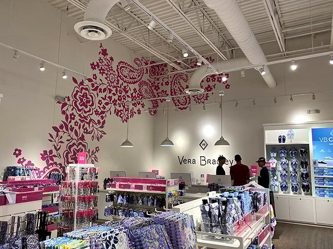 Inside Vera Bradley, a floral explosion of patterns transforms shopping into a garden party. Even the walls are blooming with possibilities!