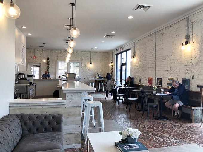 White-washed brick walls, pendant lighting, and that gray sofa calling your name&mdash;this is where "just one coffee" turns into three hours.