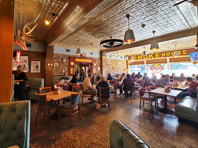 Pressed tin ceilings, antler chandeliers, and the hum of happy diners. This isn't just a restaurant; it's Michigan's living room for barbecue enthusiasts.