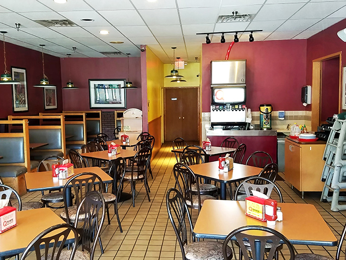 The burgundy walls aren't trying to impress you&mdash;they're just holding space until the food arrives. Simple, unpretentious, and focused on what matters.