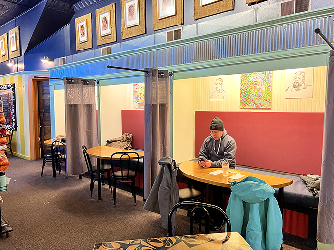 Semi-private booths with curtains create cozy nooks for intimate conversations or solo dining adventures. Coffee and privacy&mdash;what more could you want?