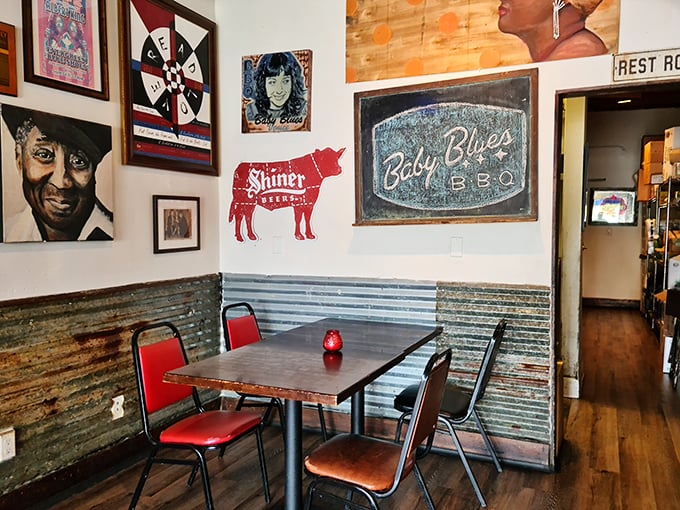 Blues legends watch over diners from the walls while the Shiner Beer cow stands guard. This isn't just decor&mdash;it's a promise of authentic barbecue heritage.
