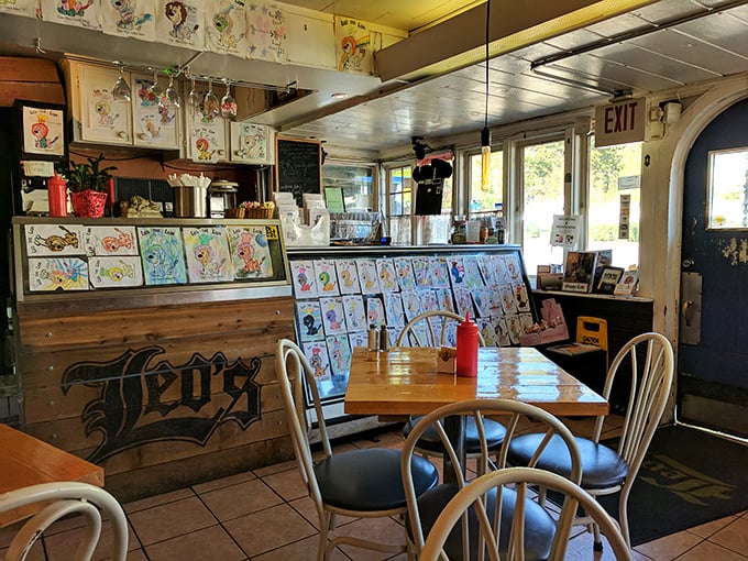 Inside, colorful artwork lines the walls while simple wooden tables invite you to linger. It's not fancy, but that's exactly the point.