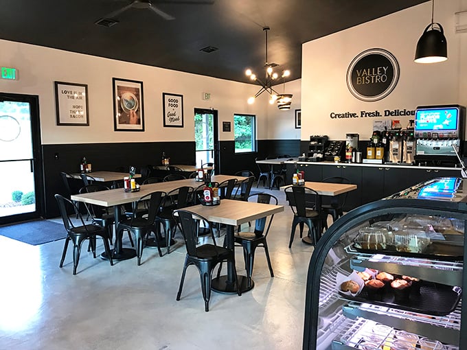 Black and white never looked so inviting. This sleek, modern interior says "we're serious about food" while the coffee station whispers "stay awhile."