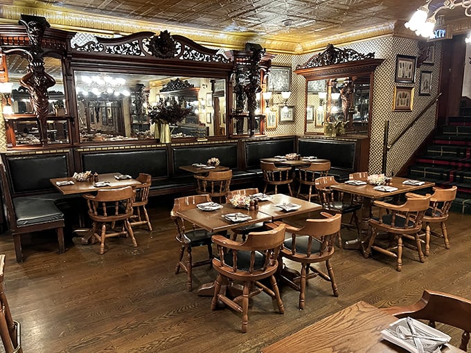 Step inside and time travel to Victorian England, where ornate wooden mirrors and cozy tables invite you to settle in for an evening of revelry.