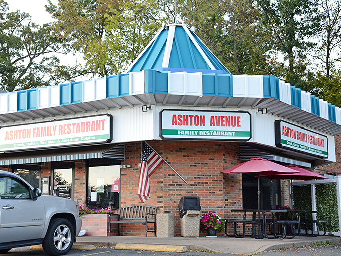Ashton Family Restaurant's distinctive blue-and-white awning stands out like a delicious mirage for hungry travelers.