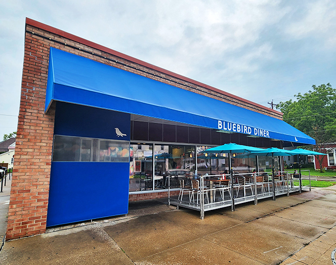 The Bluebird's bright blue awning stands out like a cheerful hello on Market Street, promising breakfast delights inside.