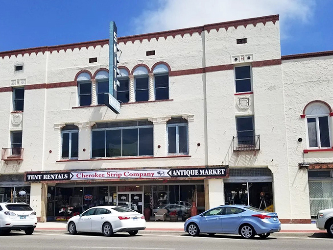 The historic Cherokee Strip Company building stands proudly in Ponca City, its white walls and red trim hinting at treasures within.