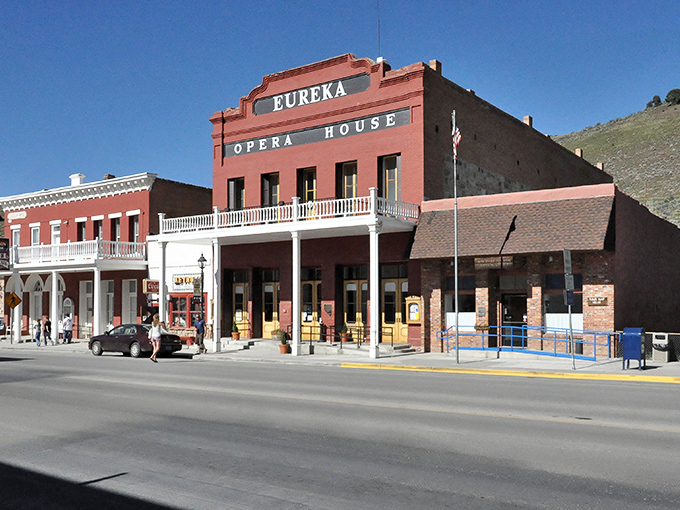 The Eureka Opera House stands proud, a red brick reminder that small towns know how to put on a show.