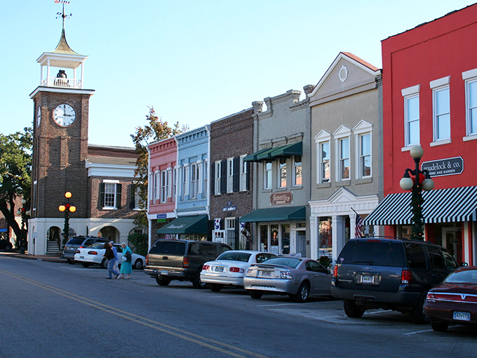Georgetown's historic clock tower stands watch over colorful storefronts. Time literally slows down in this waterfront gem!