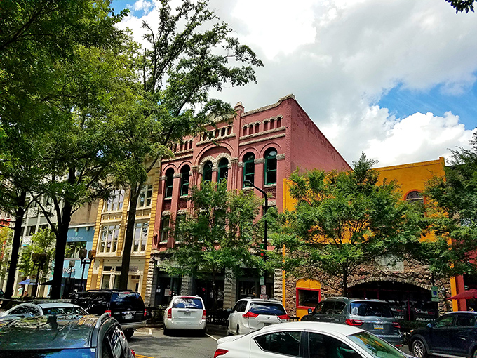 Greenville's vibrant downtown buildings pop with color against a Carolina blue sky. The brick facades tell stories if you listen closely enough.