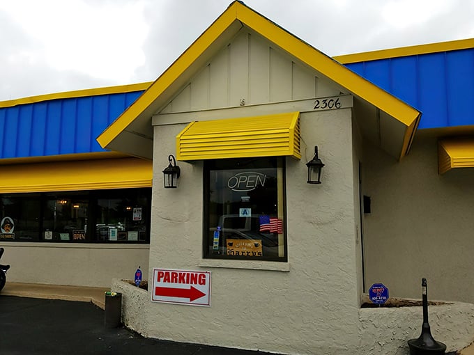 Harry's bright blue exterior is like a breakfast beacon, promising pancakes that could make IHOP executives weep with jealousy.