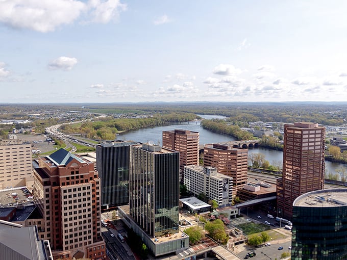 Hartford's downtown gleams beside the winding Connecticut River, a perfect blend of urban energy and natural beauty.