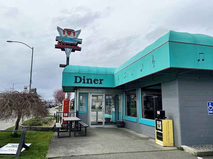 This turquoise time machine serves up eggs with a side of nostalgia, proving that sometimes the best diners are hiding in plain sight.
