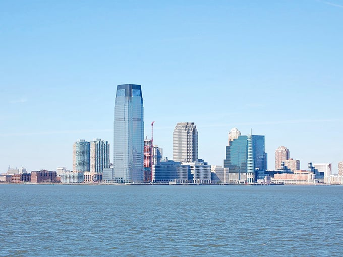 Jersey City's gleaming skyline rises majestically across the Hudson, offering Manhattan views without the Manhattan price tag.