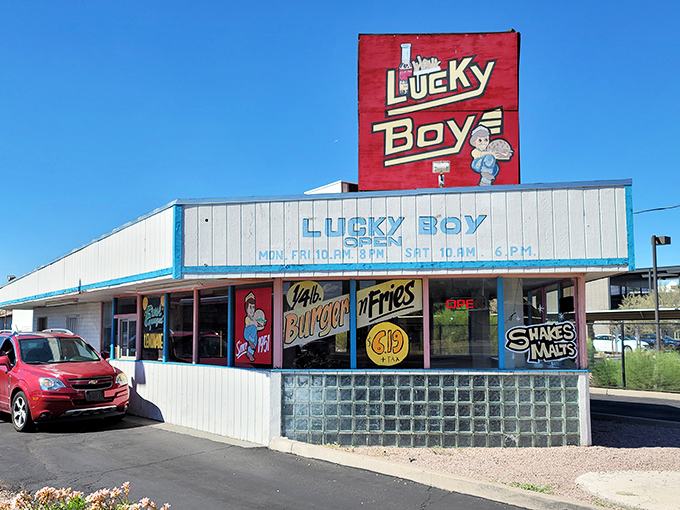 Lucky Boy's vintage sign and classic white building scream "hidden gem." This no-frills burger joint has been quietly winning Phoenix hearts one patty at a time.
