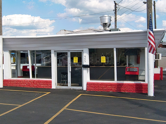 Midway West Drive-In: Classic white-and-red building standing proud – like the burger equivalent of a Norman Rockwell painting.