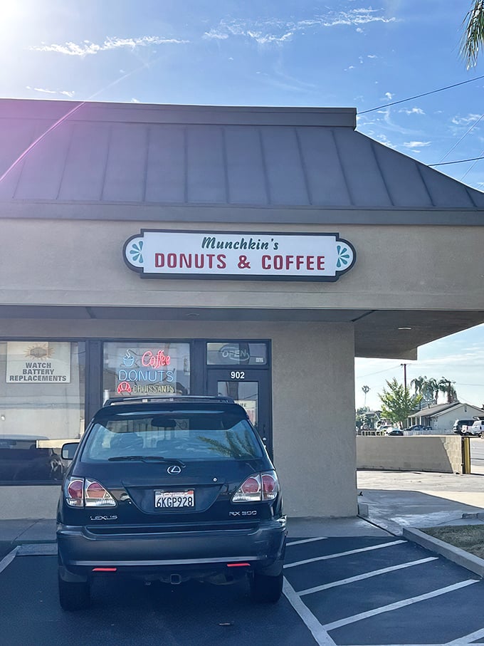Munchkin's magic: Where donuts and nostalgia collide! This cozy corner shop looks like it's been serving up smiles for decades.