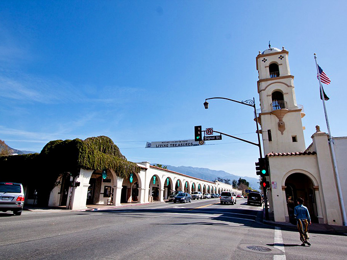 The iconic bell tower stands sentinel over this peaceful valley town, where the famous "pink moment" sunset transforms everything into a rosy dreamscape.