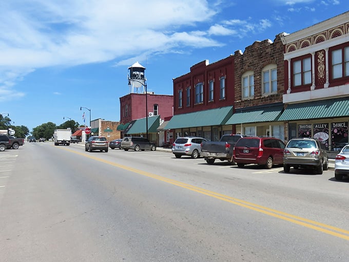 Historic Perkins showcases its small-town pride with that iconic water tower standing guard over red brick buildings frozen in time.