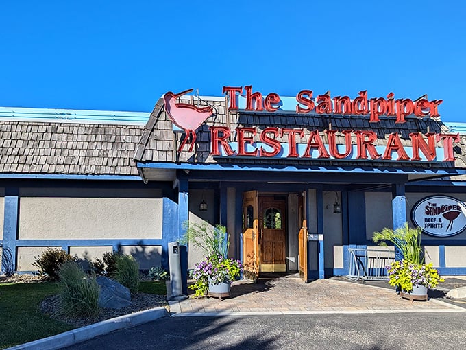 The Sandpiper's iconic red sign has guided hungry seafood lovers for years, like a lighthouse for those navigating the desert of mediocre fish options.