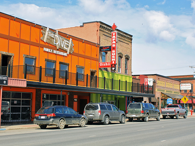 Colorful storefronts bring vibrant energy to Sandpoint's downtown - like a Norman Rockwell painting that installed WiFi.