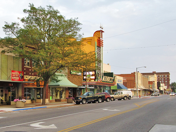 That vibrant red building in downtown Scottsbluff isn't just eye-catching – it's practically waving "howdy" to everyone passing by!