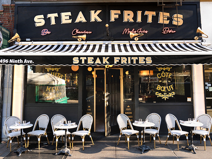 Parisian vibes meet New York hustle at Steak Frites, where those black and white awnings promise a splash of French indulgence.