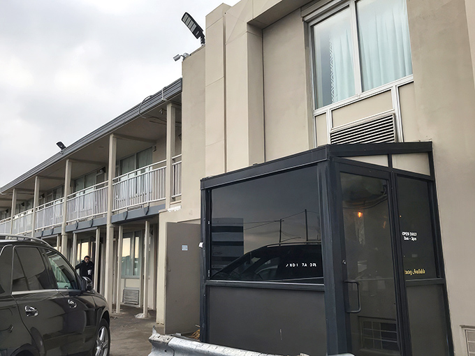 The Clique hides in plain sight like a breakfast speakeasy. Behind that unassuming facade lies a symphony of sizzling hash.