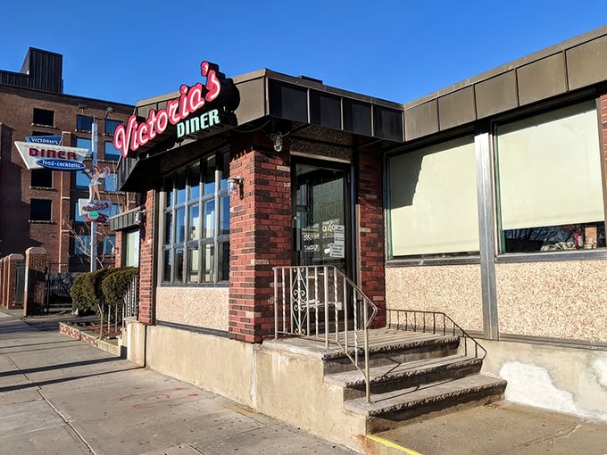 Victoria's neon pink sign has guided hungry night owls to comfort food paradise for decades, like a culinary lighthouse in Boston's sea of restaurants.