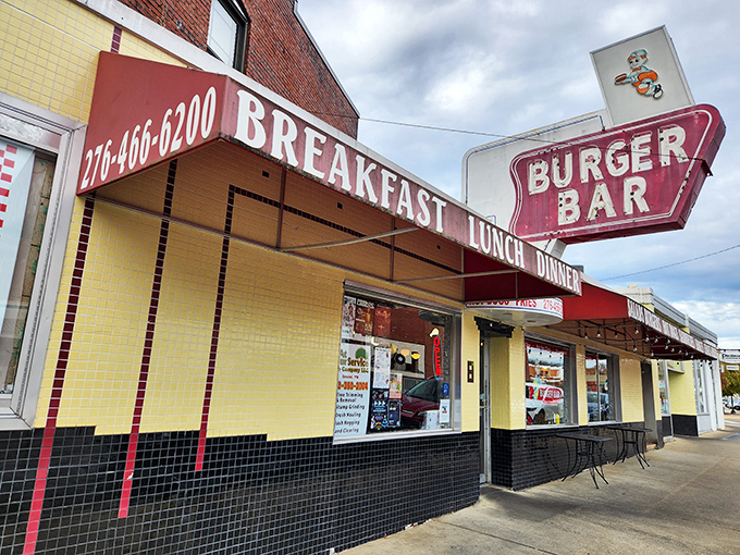 Downtown diners know the sign means satisfaction. The Burger Bar's vintage appeal draws you in for that perfect patty experience.